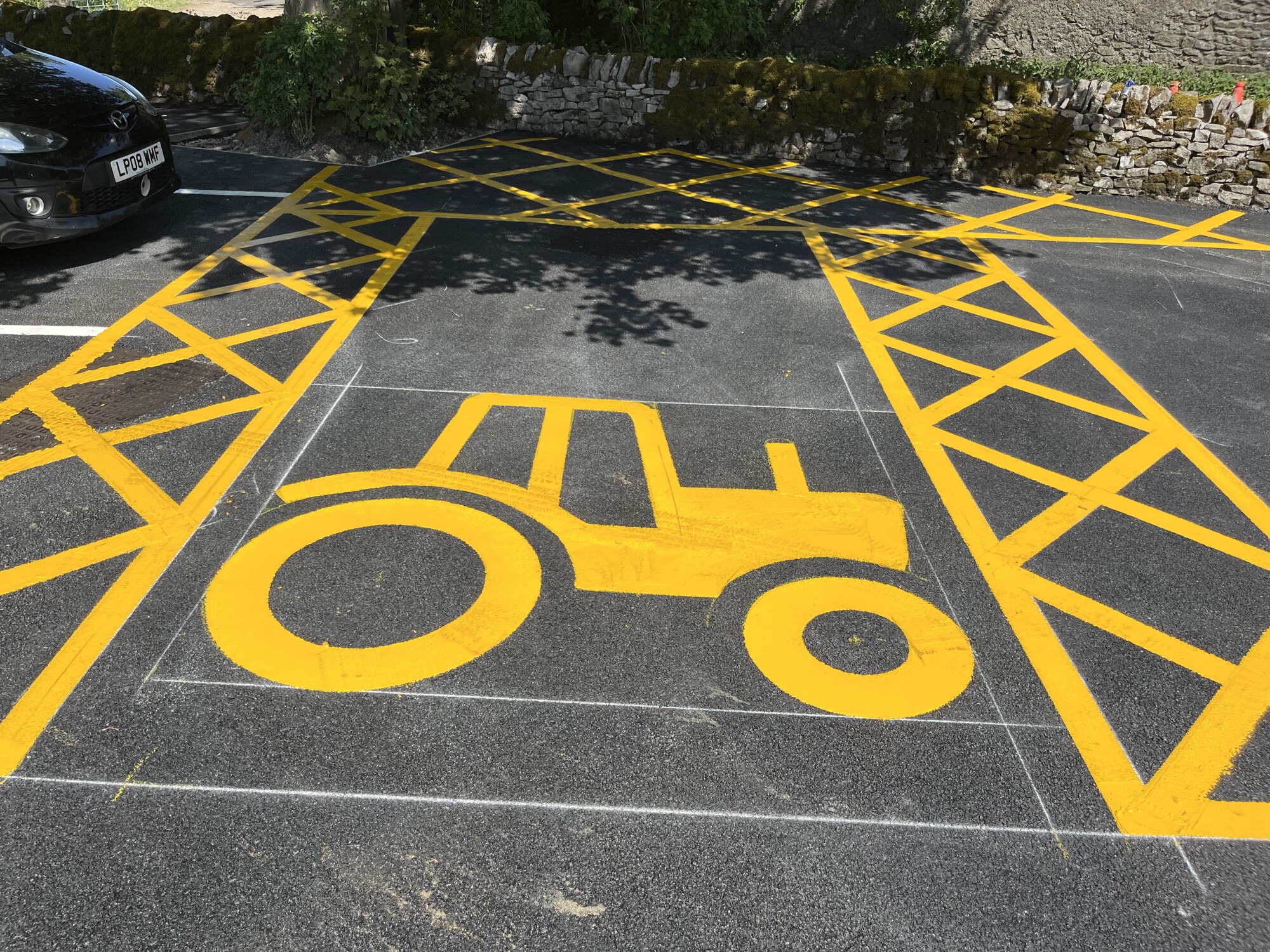 Derbyshire pub owner introduces tractor parking bay for local farmers ...